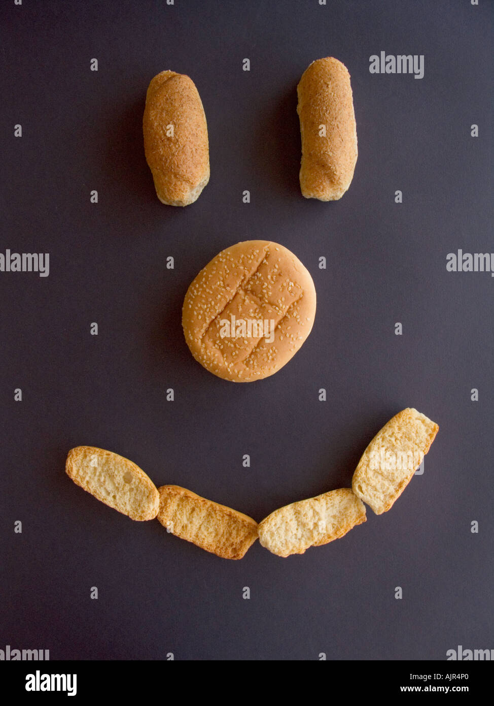 composition of different bread types - bun baguettes - arrangend in a ...