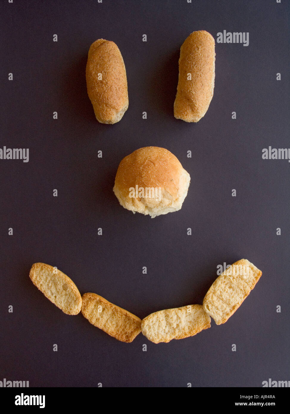 composition of different bread types - bun baguettes - arrangend in a ...