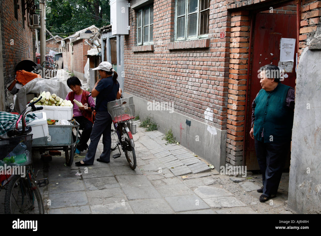 Street scene at a Hutong Beijing China Stock Photo - Alamy