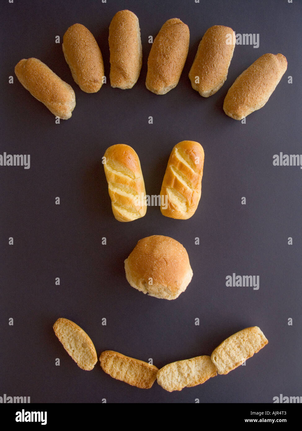 composition of different bread types - bun baguettes - arrangend in a ...