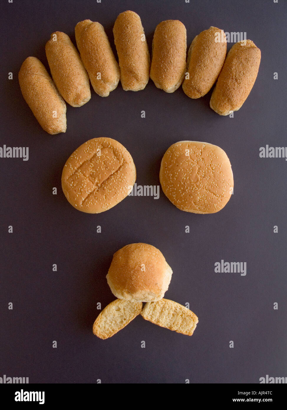 composition of different bread types - bun baguettes - arrangend in a ...