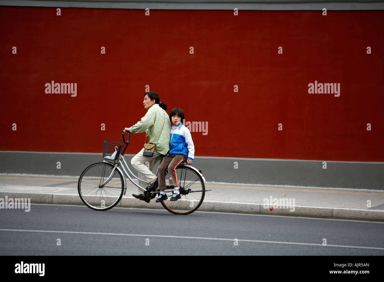 People riding bicycle outside the forbidden city Beijing China Stock ...