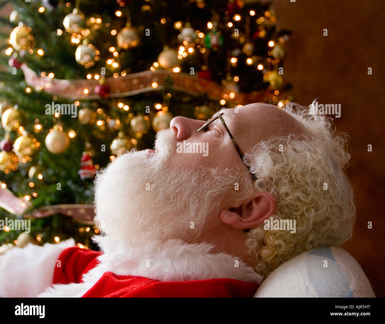 Santa taking a nap Stock Photo - Alamy