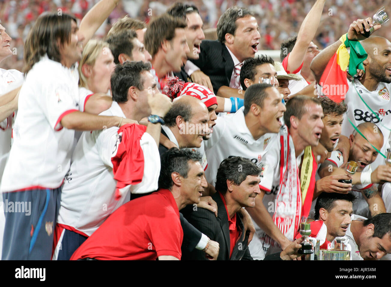 Players and staff of Sevilla FC celebrating the title on the field ...