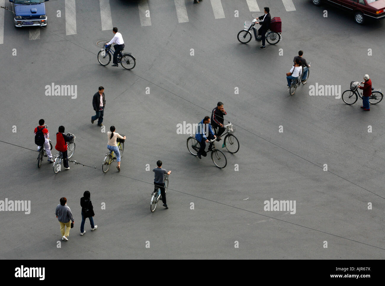 People riding bicycle Beijing China Stock Photo - Alamy
