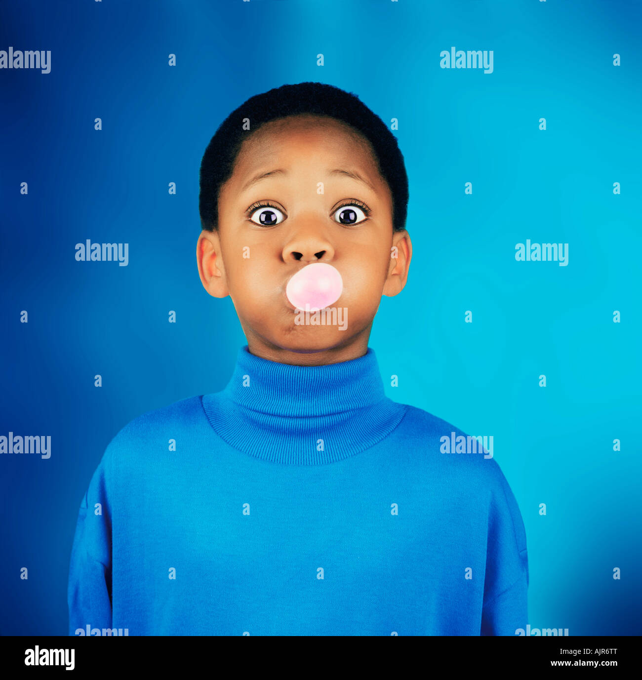 Boy blowing bubble gum hi-res stock photography and images - Alamy