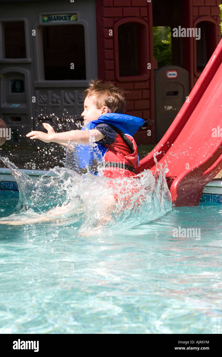 Boy Sliding Down A Water Slide High Resolution Stock Photography and ...