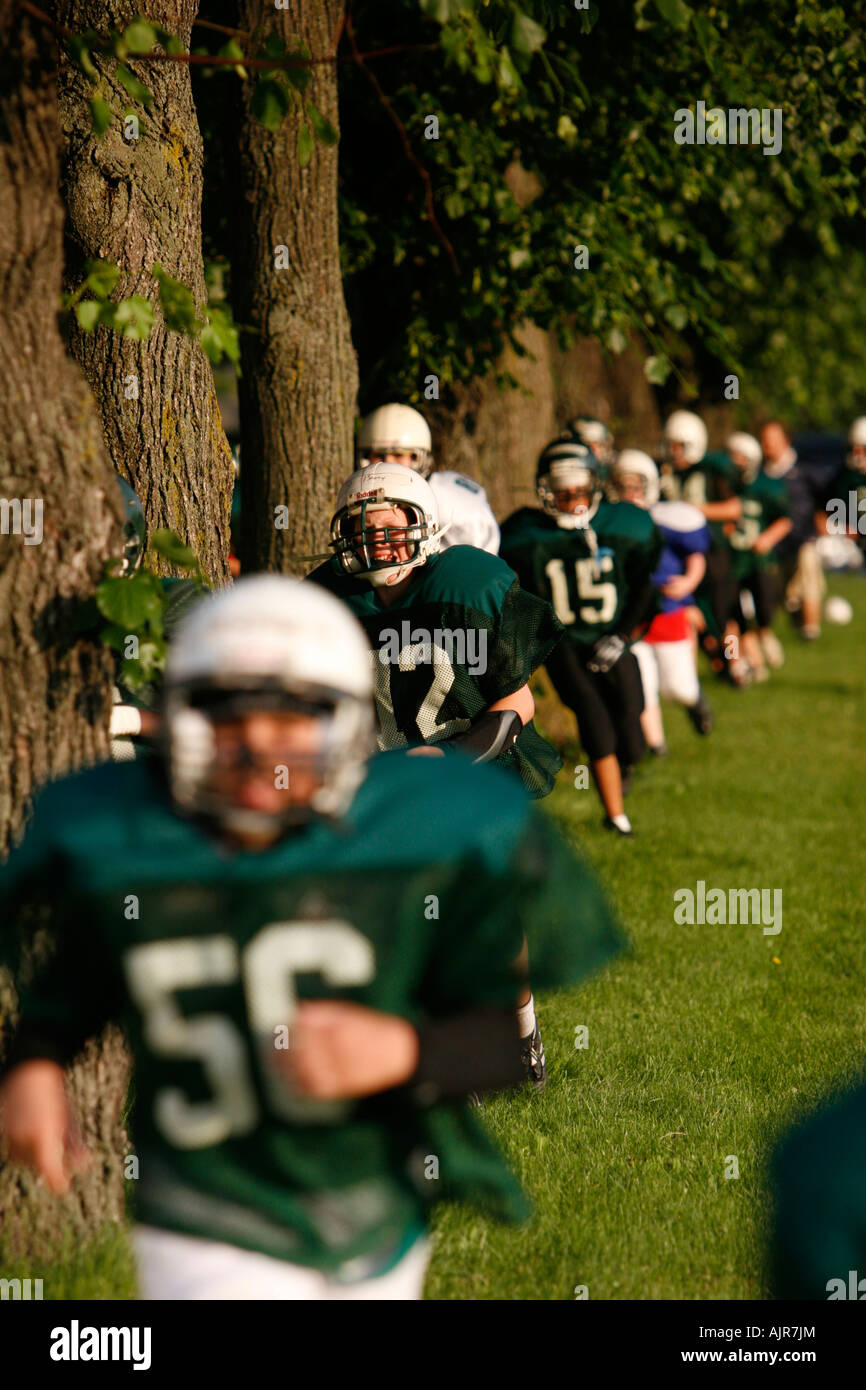 tackel football youth teens playing tackle football during practice in ...
