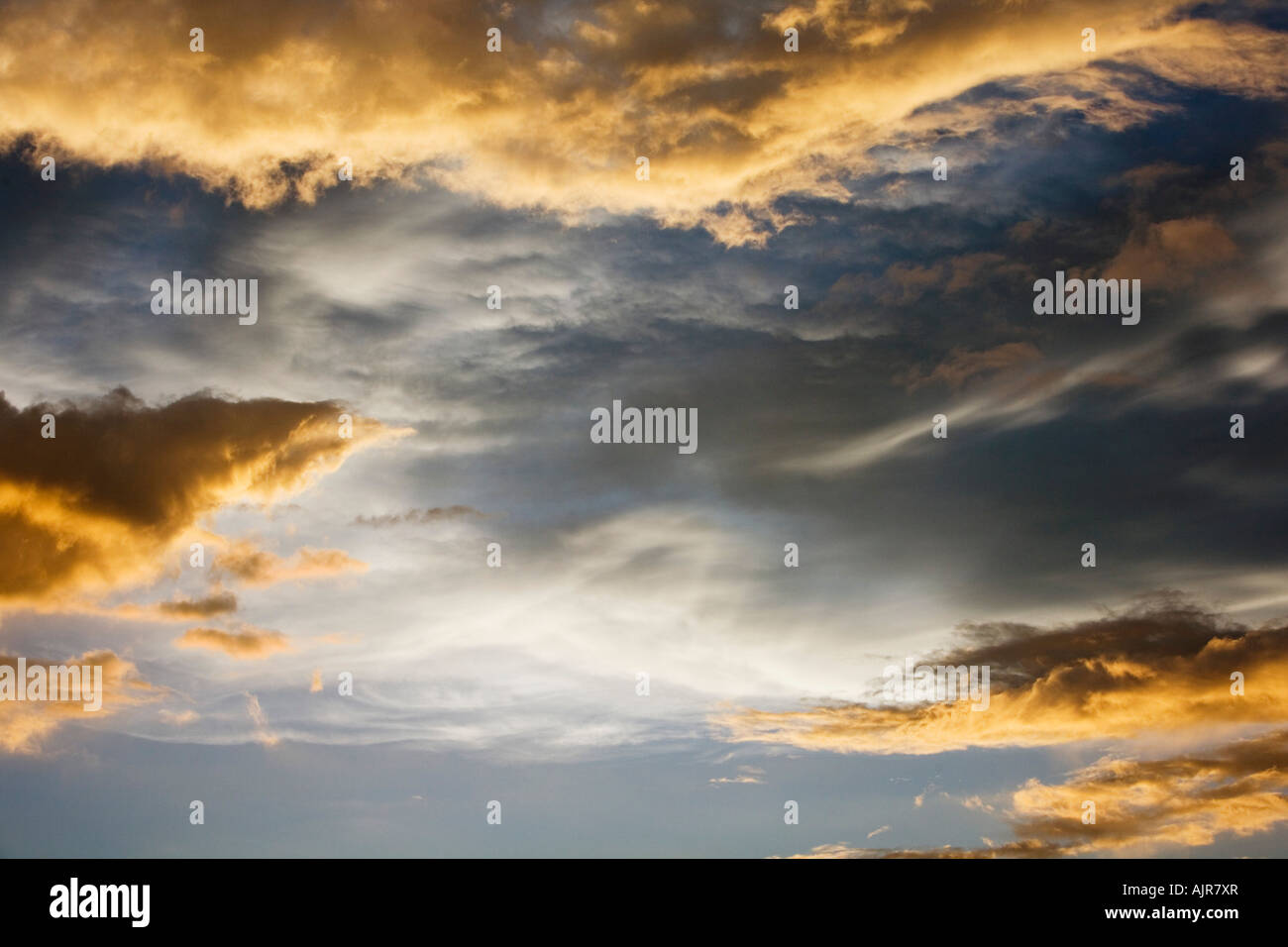 Sunset storm clouds in India. Indian cloudy sky in the evening sunlight ...