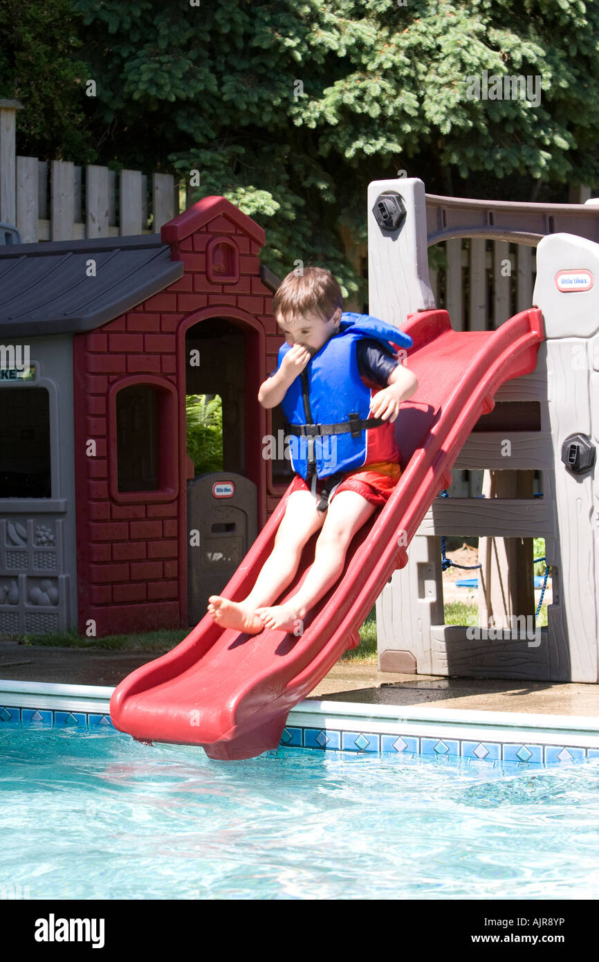 Boy Sliding Down A Water Slide High Resolution Stock Photography and ...