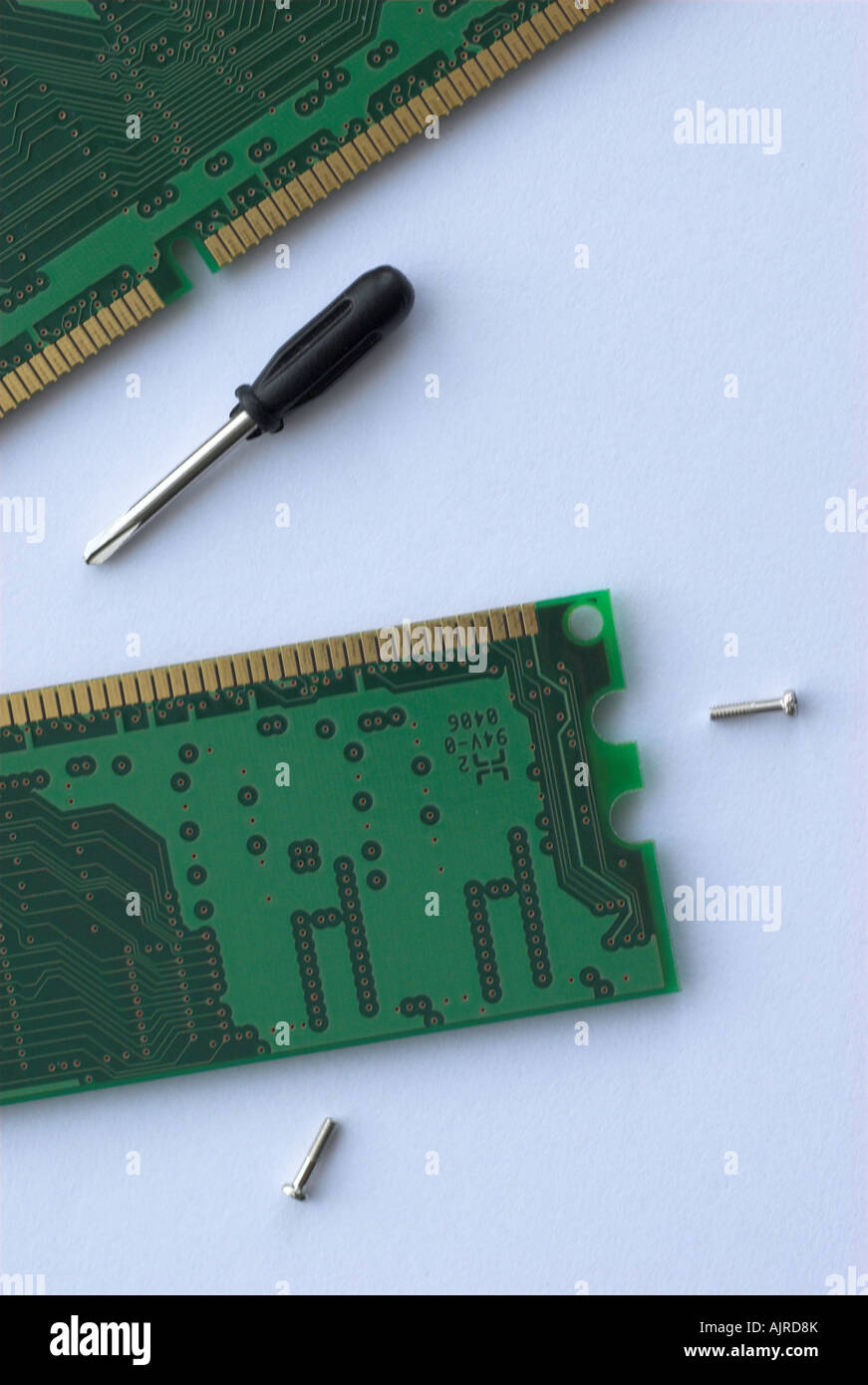 Memory boards, screwdriver and two screws Stock Photo - Alamy