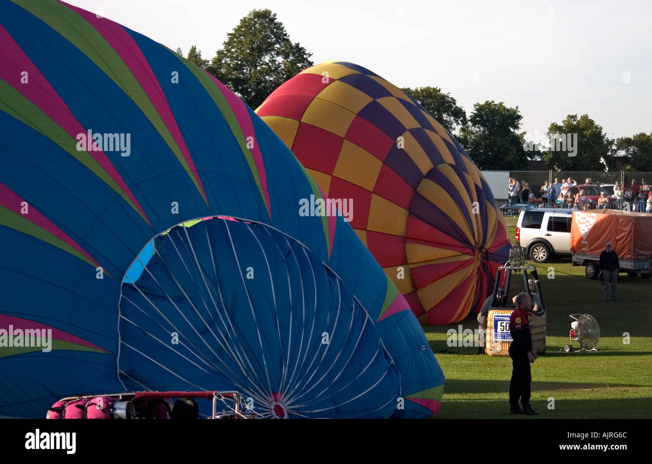 2 Balloons being filled with air Stock Photo - Alamy