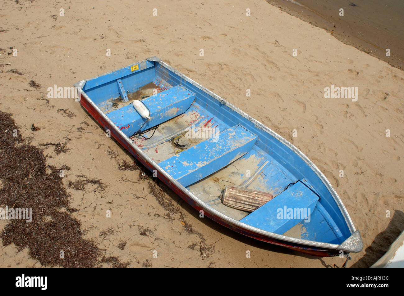 row boat boat vessel wooden boat beached boat beach sand sandy beach ...