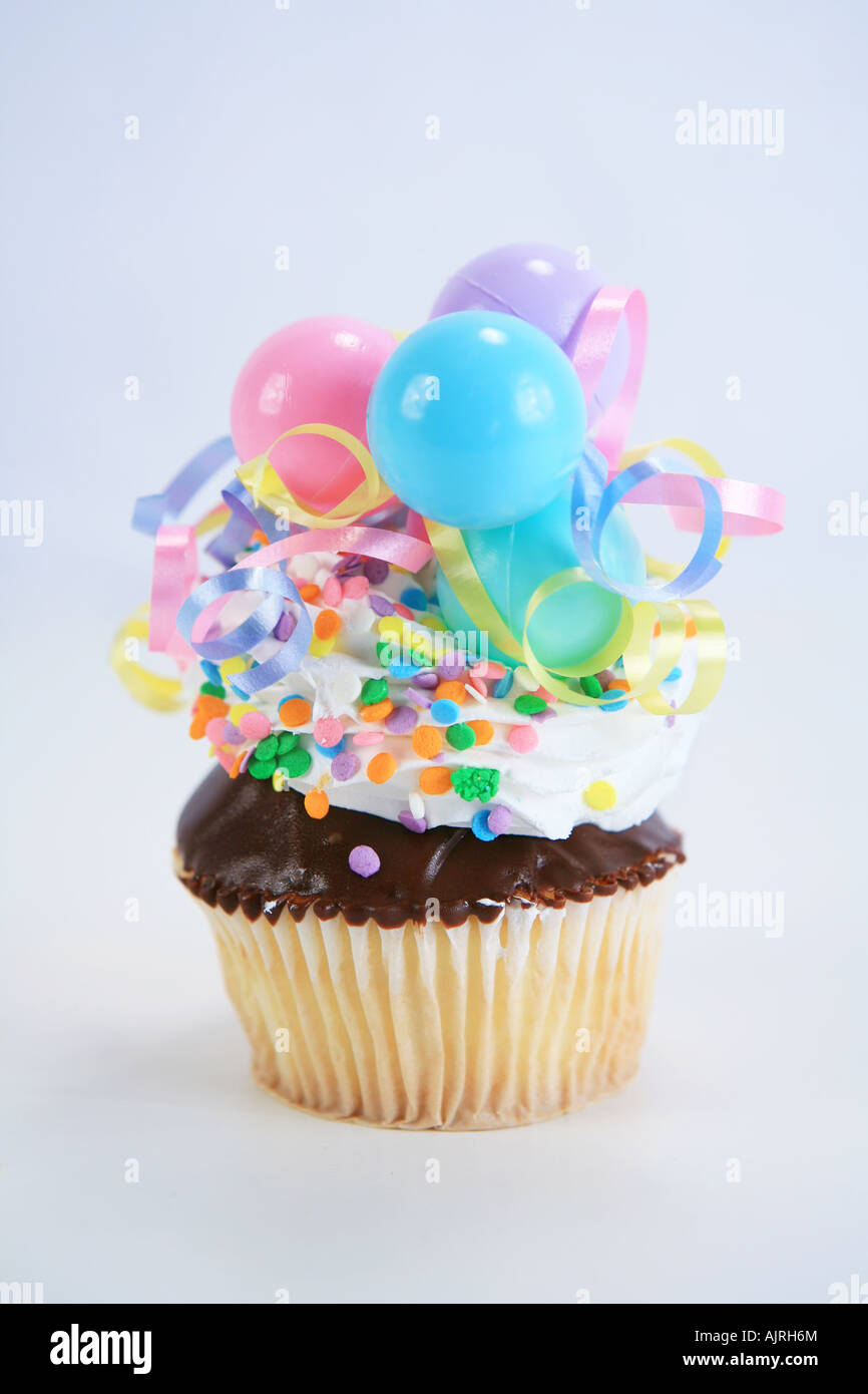 Decorated happy birthday cupcake isolated Stock Photo - Alamy