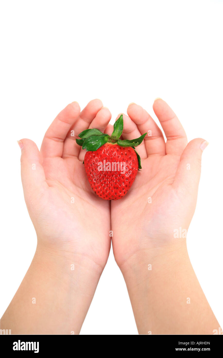 Large Ripe Strawberry in Hand isolated on white background Stock Photo ...