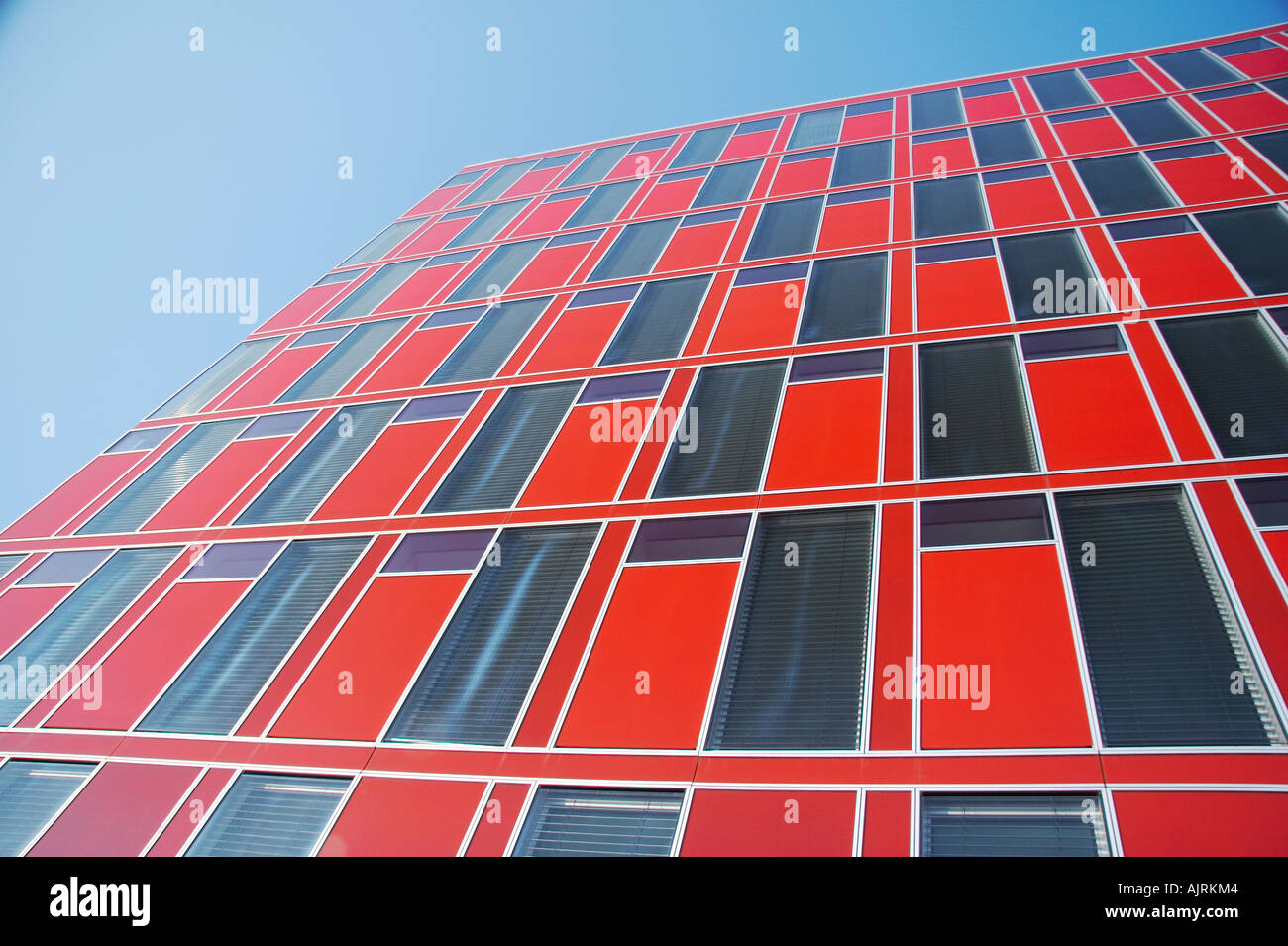 Red modern office building Stock Photo - Alamy