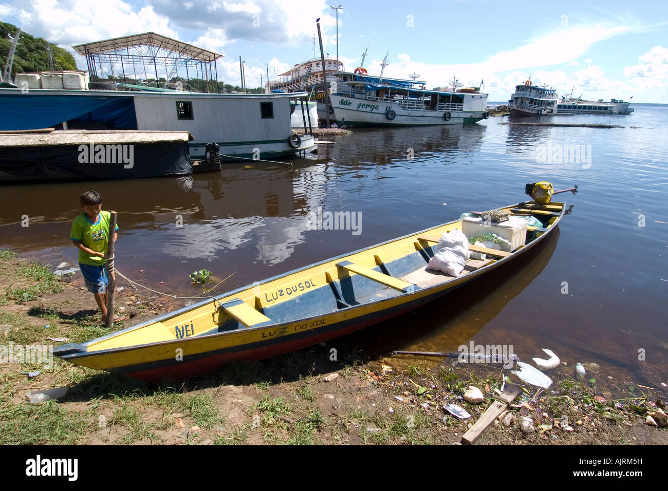 Boats on Solimoes river Tefe Amazonas Brazil Stock Photo - Alamy