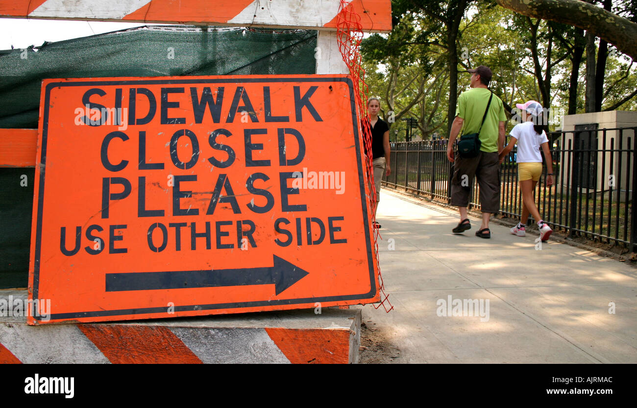 Sidewalk Closed Please Use Otherside warning sign in New York City in ...