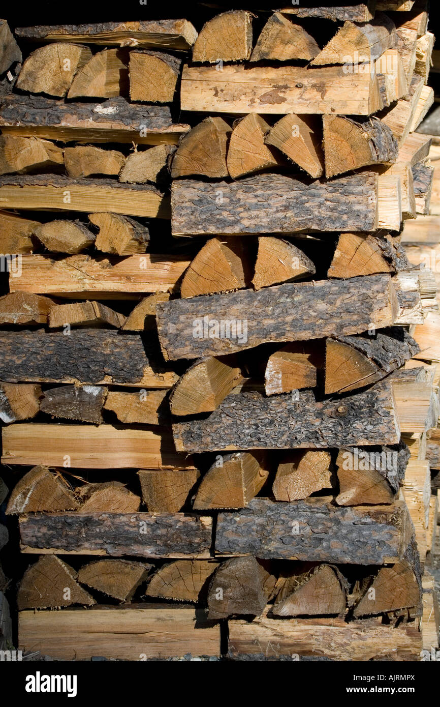 Split logs for firewood Stock Photo - Alamy