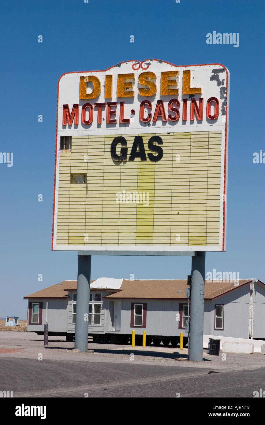 Worn out gas station sign and trailers in the Nevada desert Stock Photo ...