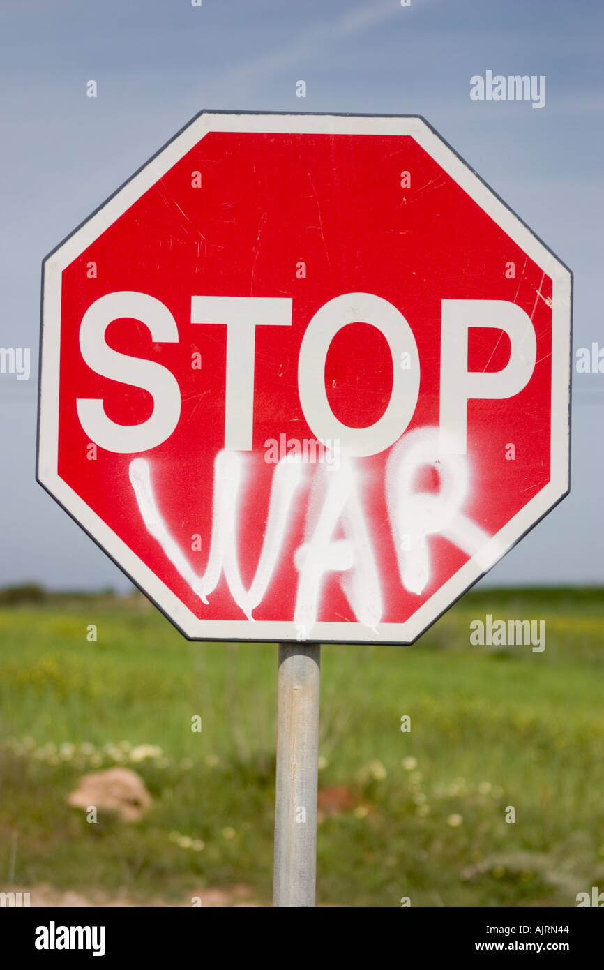 Stop sign transformed into a stop war message with spray paint Stock ...