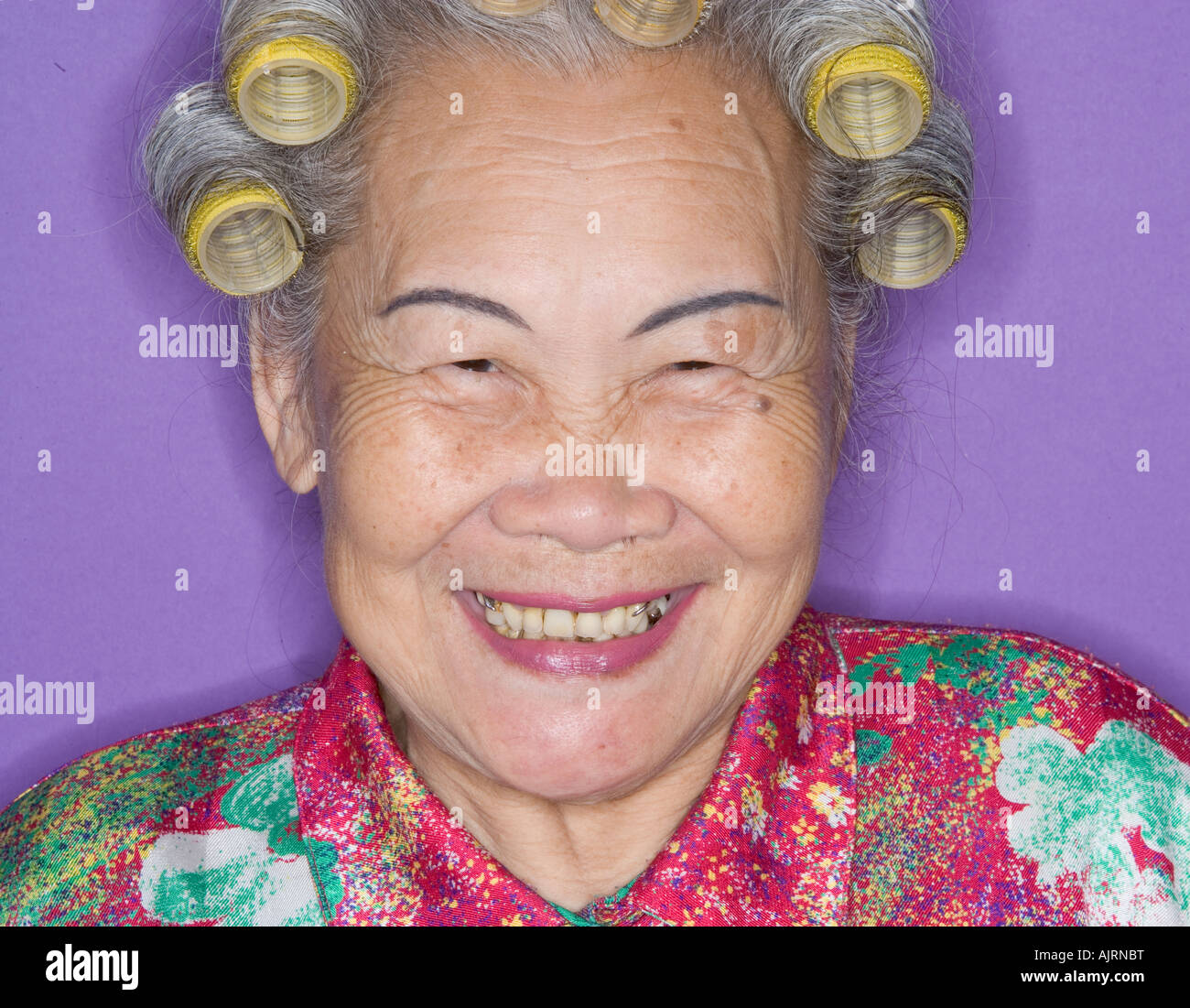 Woman curlers pajamas hi-res stock photography and images - Alamy