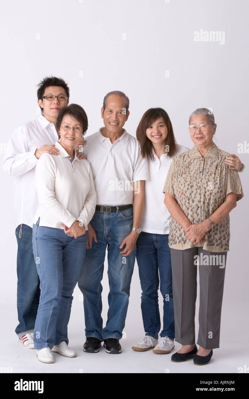 Portrait of a family standing together Stock Photo - Alamy