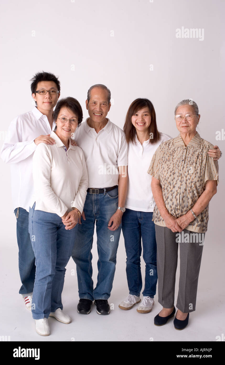 Portrait of a family standing together Stock Photo - Alamy