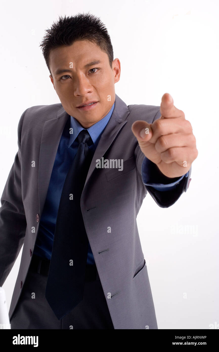 Businessman suit pointing up hi-res stock photography and images - Alamy