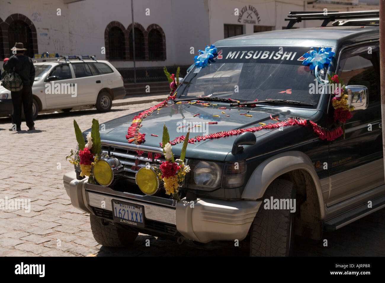Car waiting to be blessed by a priest in Copacabana a town on the ...
