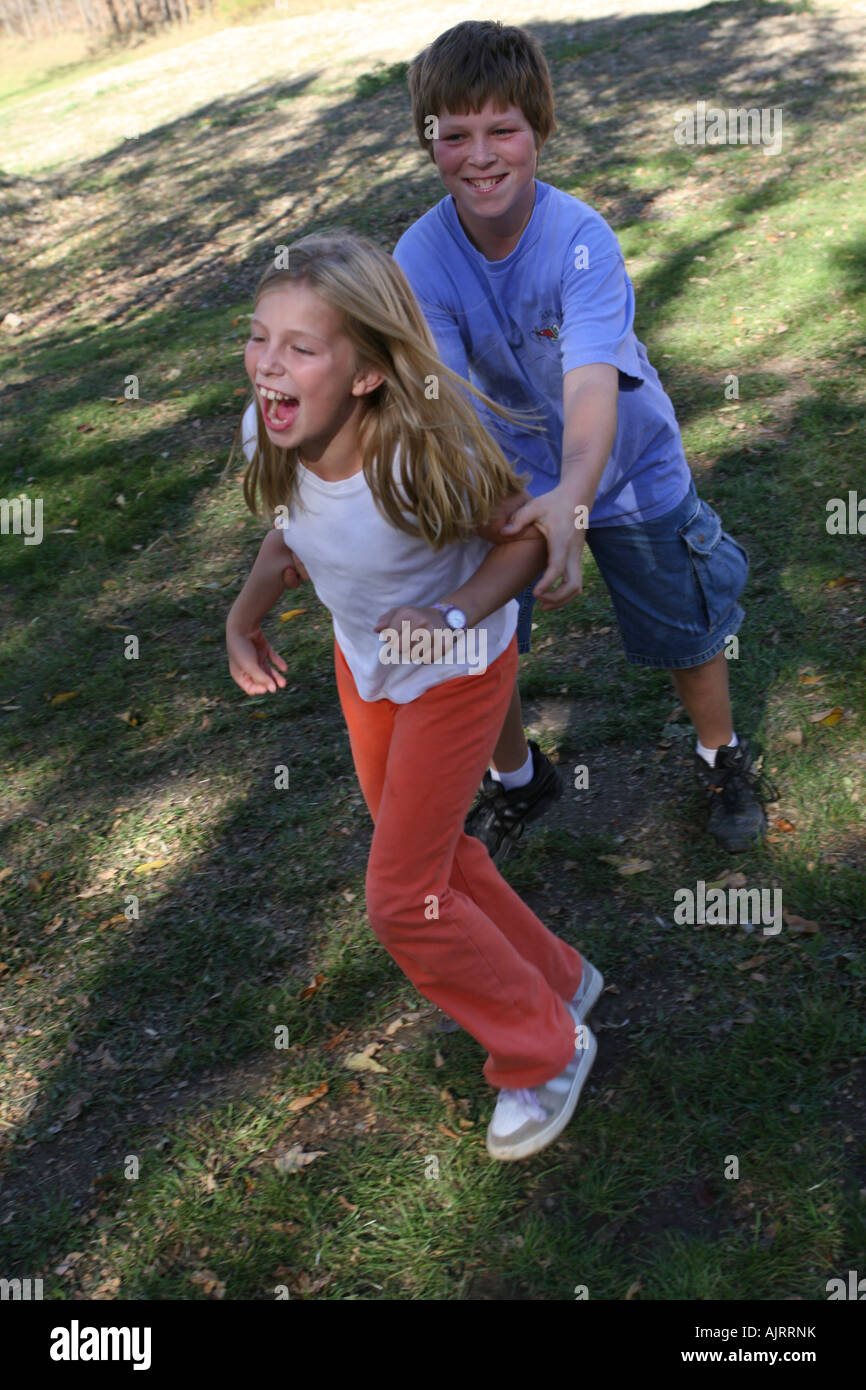 boy chasing girl Stock Photo - Alamy