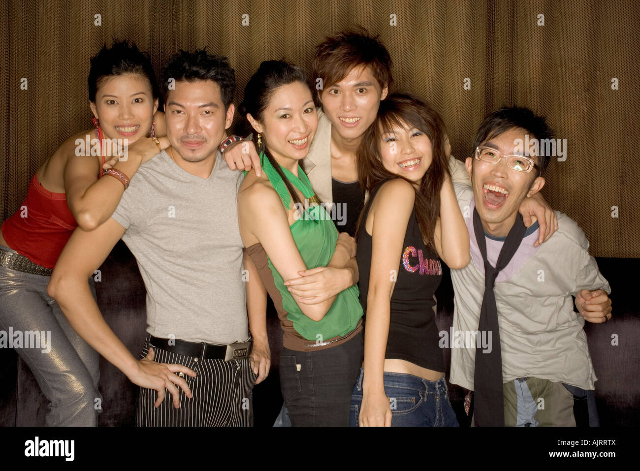 Portrait of a group of people smiling Stock Photo - Alamy