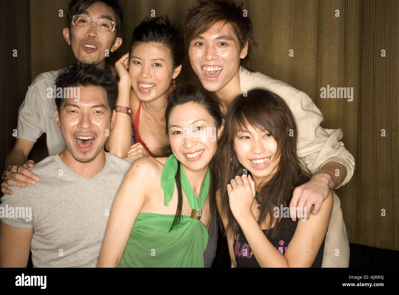 Portrait of a group of people smiling Stock Photo - Alamy