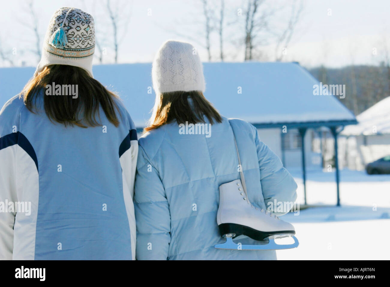 Girls wearing winter clothing Stock Photo - Alamy