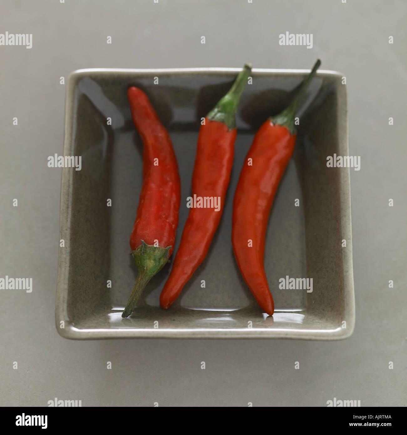 Close up of three chillies hi-res stock photography and images - Alamy