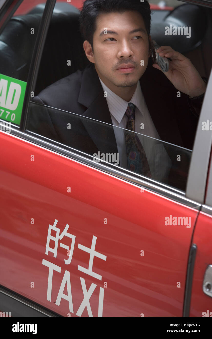 Businessman inside taxi cab cell hi-res stock photography and images ...