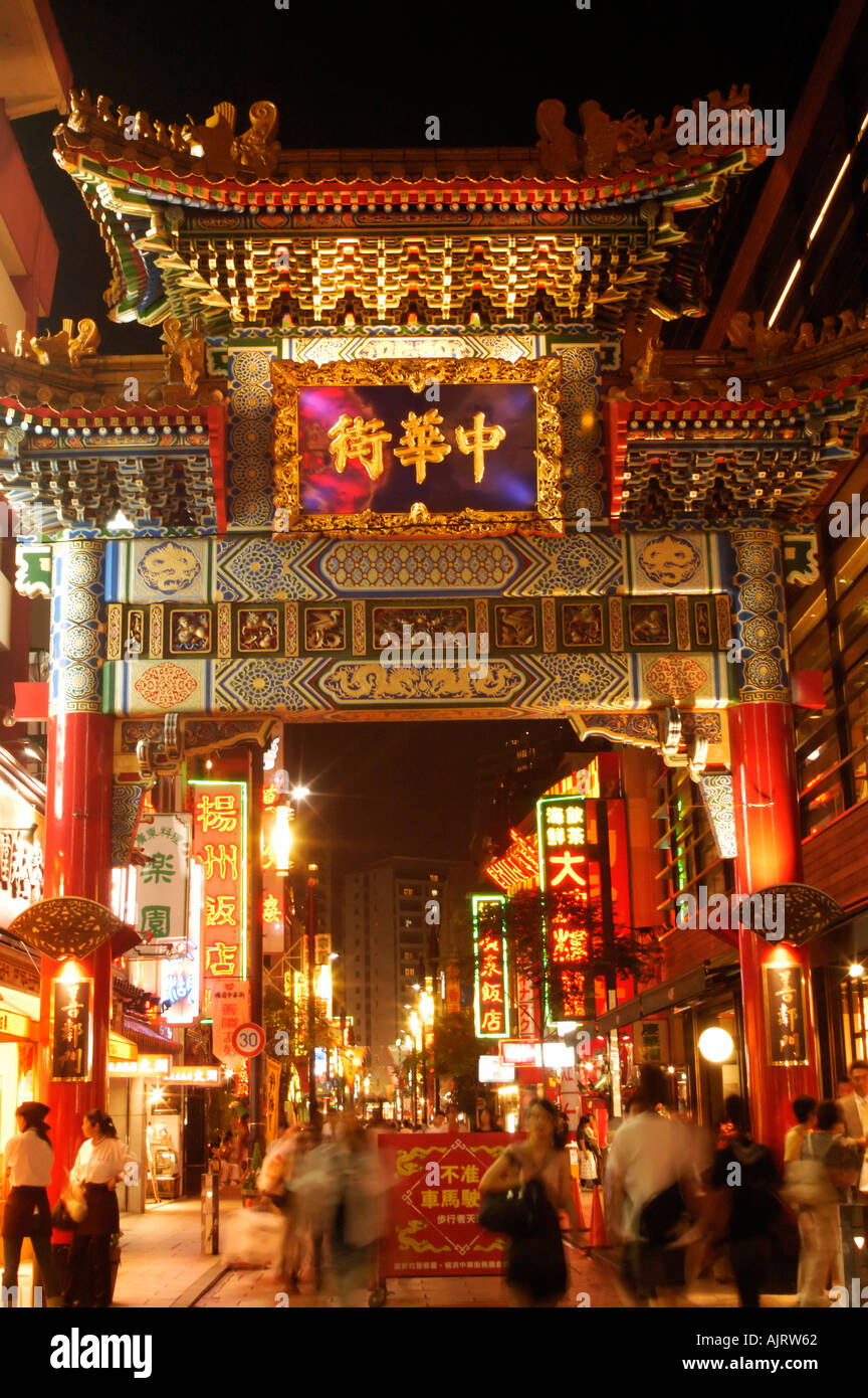 Night view of traditional colourful entrance gate to Yokohama Chinatown ...