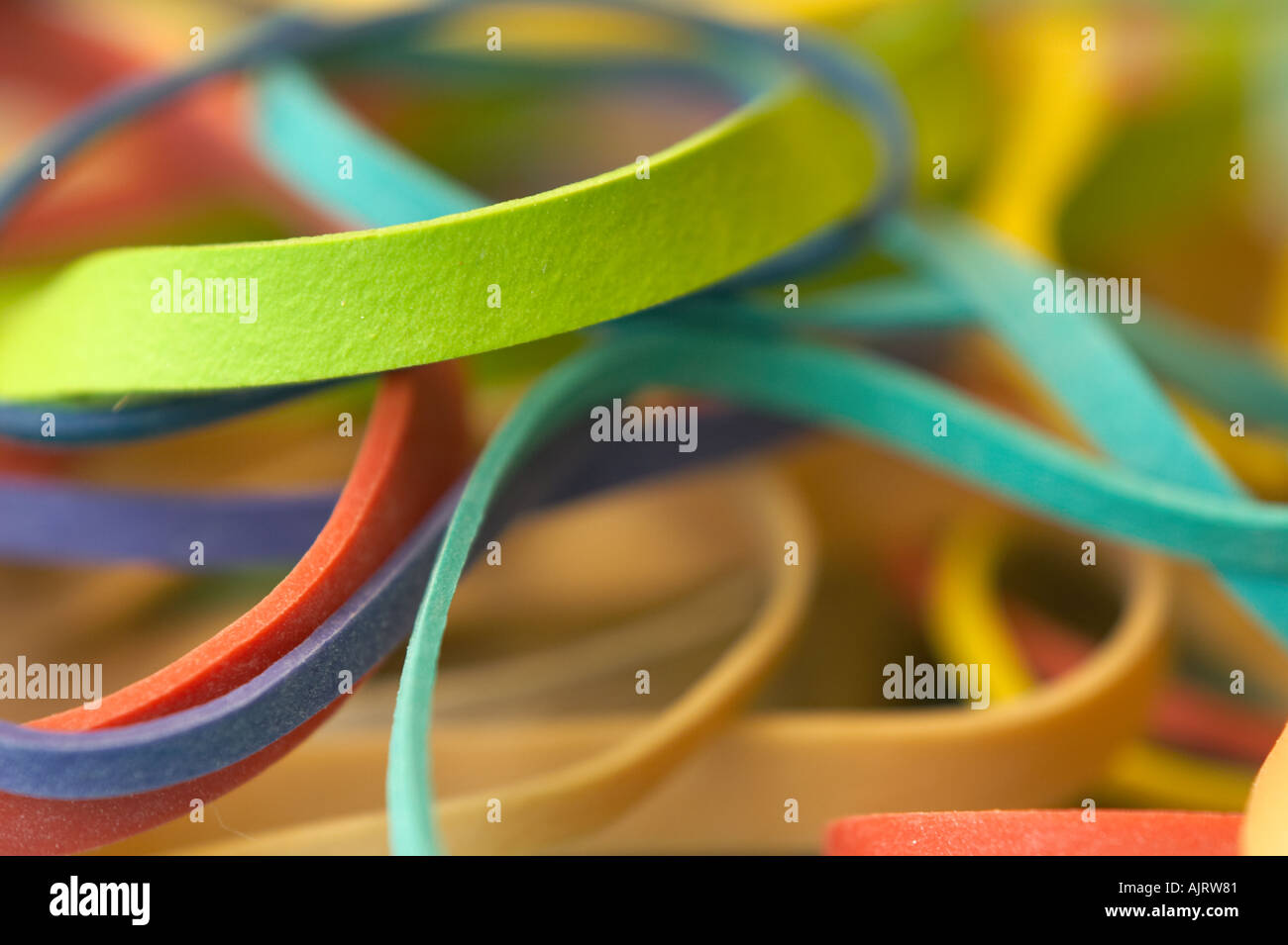A group pile of multi colored rubber bands Stock Photo - Alamy