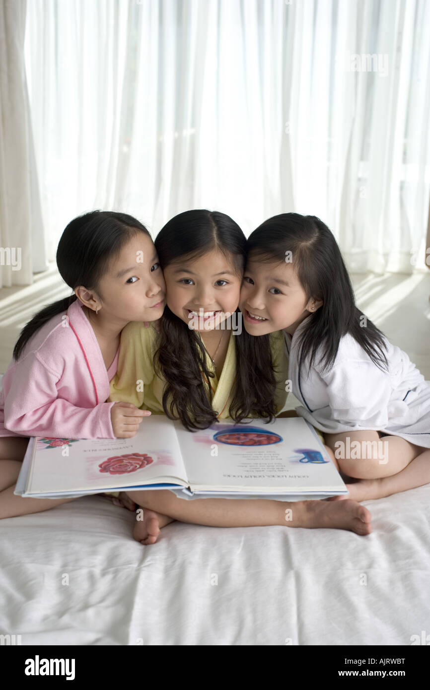 Portrait of three girls smiling Stock Photo - Alamy