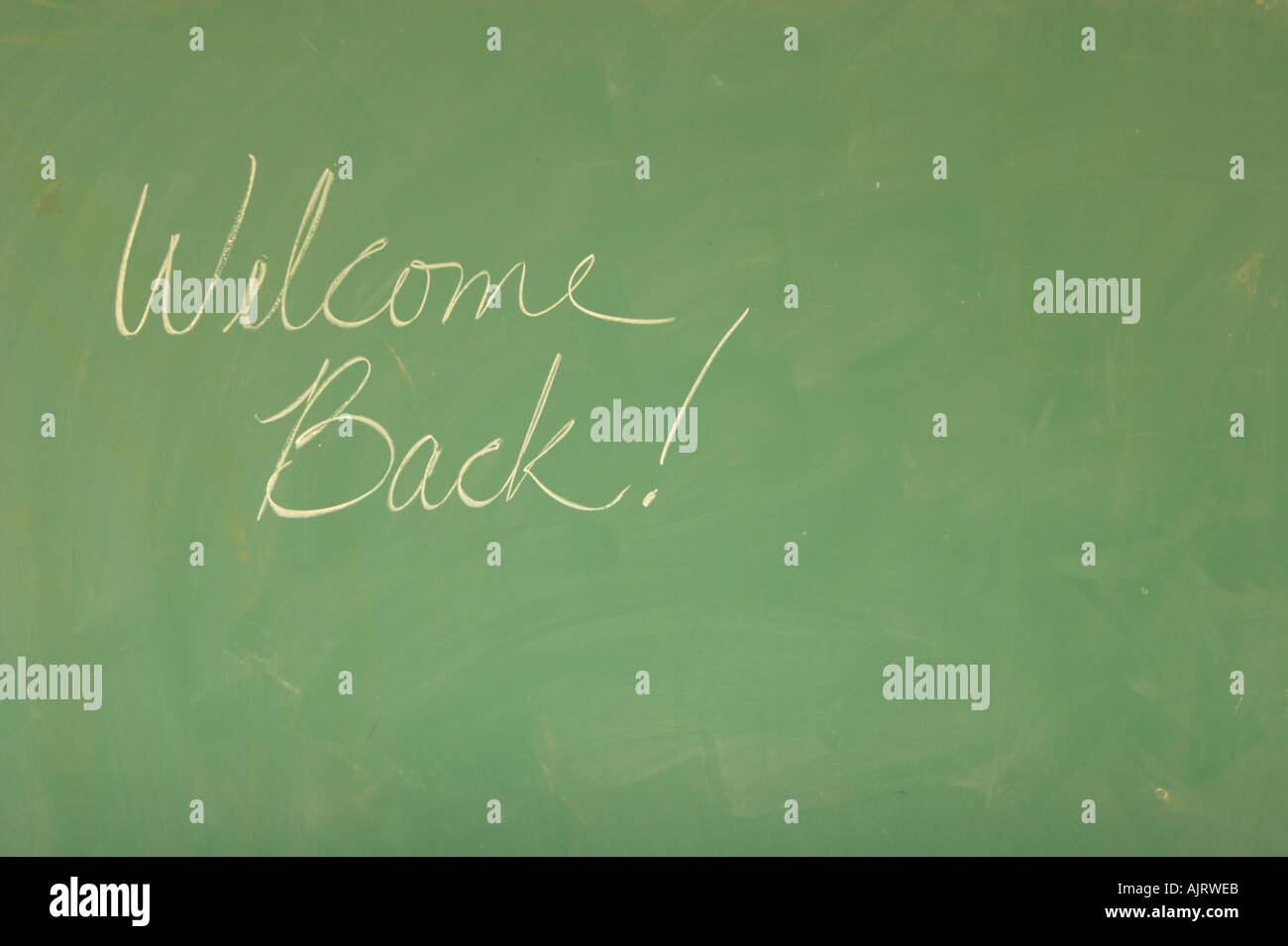 A note on a chalk board saying welcome back to school Stock Photo - Alamy