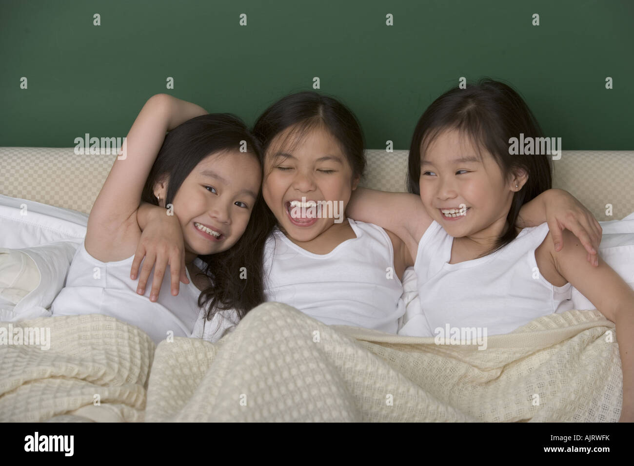 Close-up of three girls smiling Stock Photo - Alamy