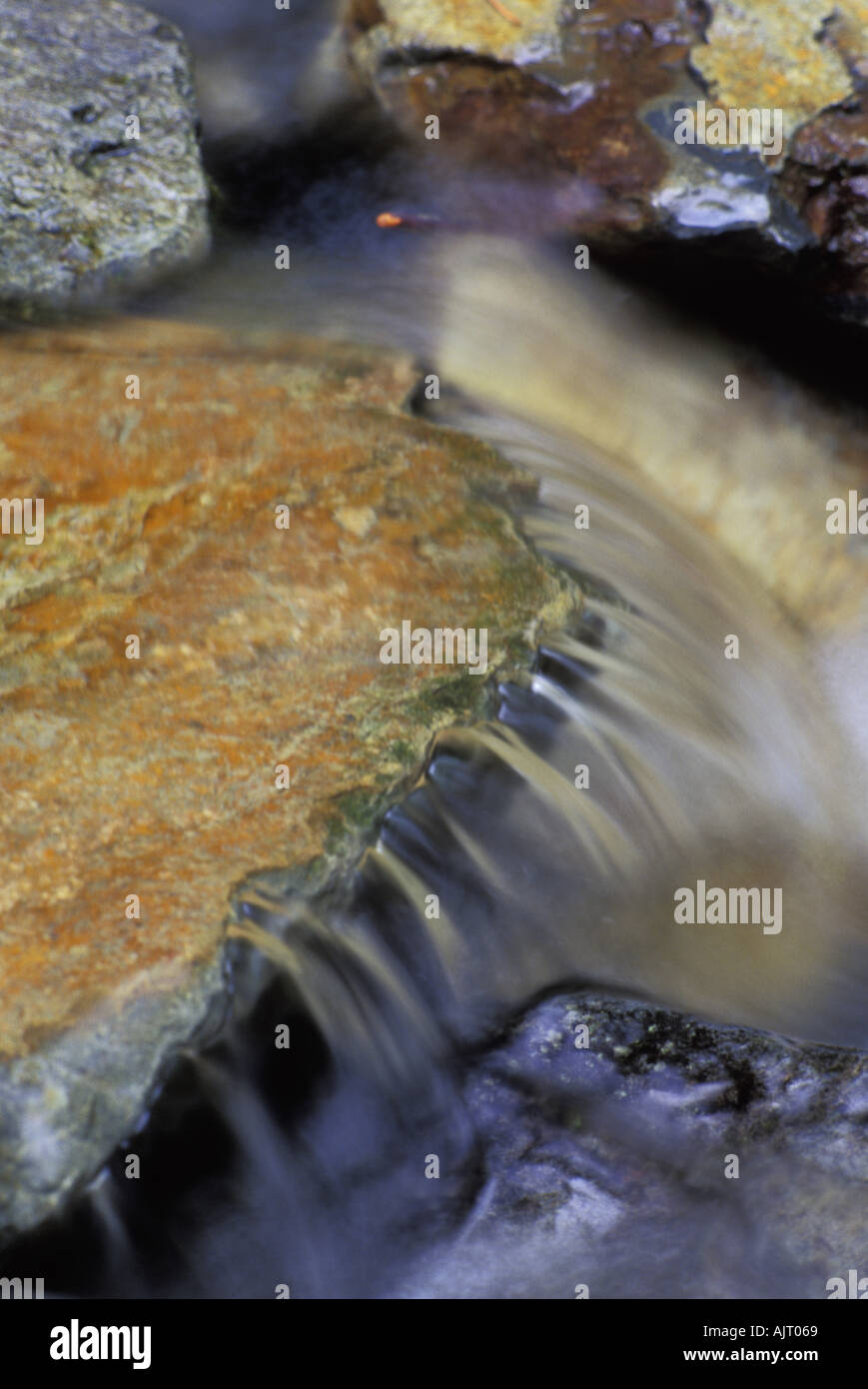 Water flowing over rocks Stock Photo - Alamy