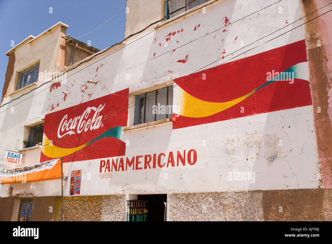 Sign on a building in Copacabana a town on the shores of Lake Titicaca ...
