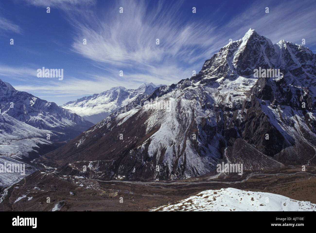Mountain range with valley in forefront Stock Photo - Alamy