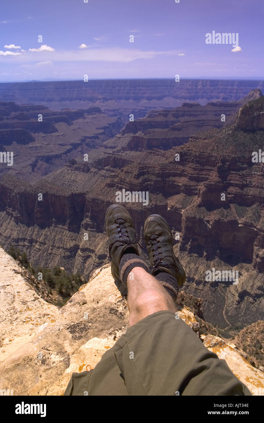Man sitting on rock at the edge of river hi-res stock photography and ...