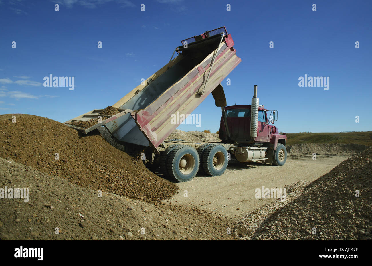 Dump Truck Dumping Gravel