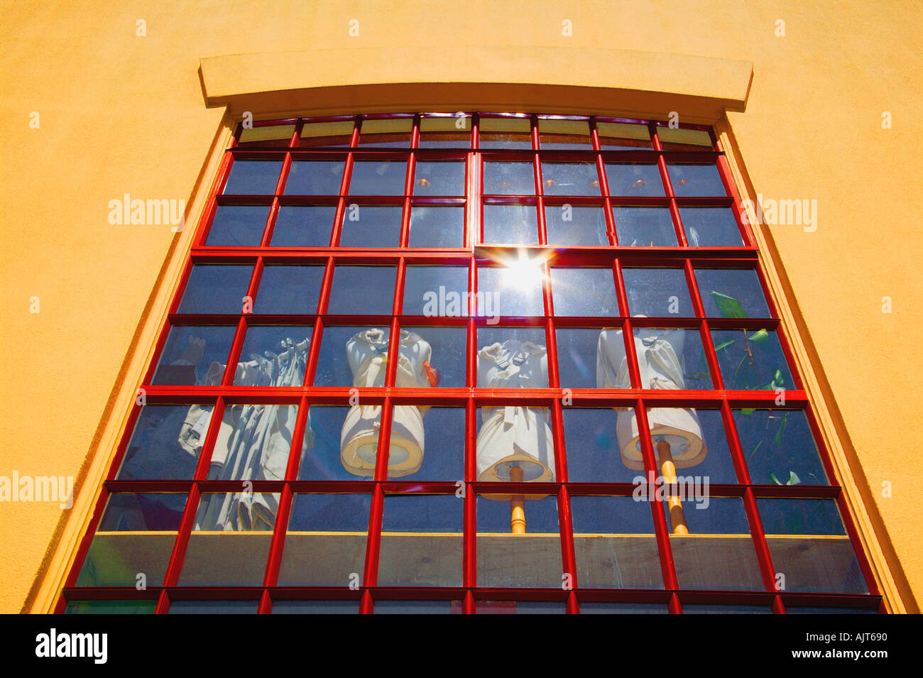 Window display of dressed tailors dummies Stock Photo - Alamy