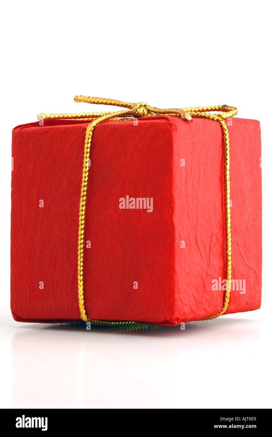 Red wrapped gift Stock Photo - Alamy