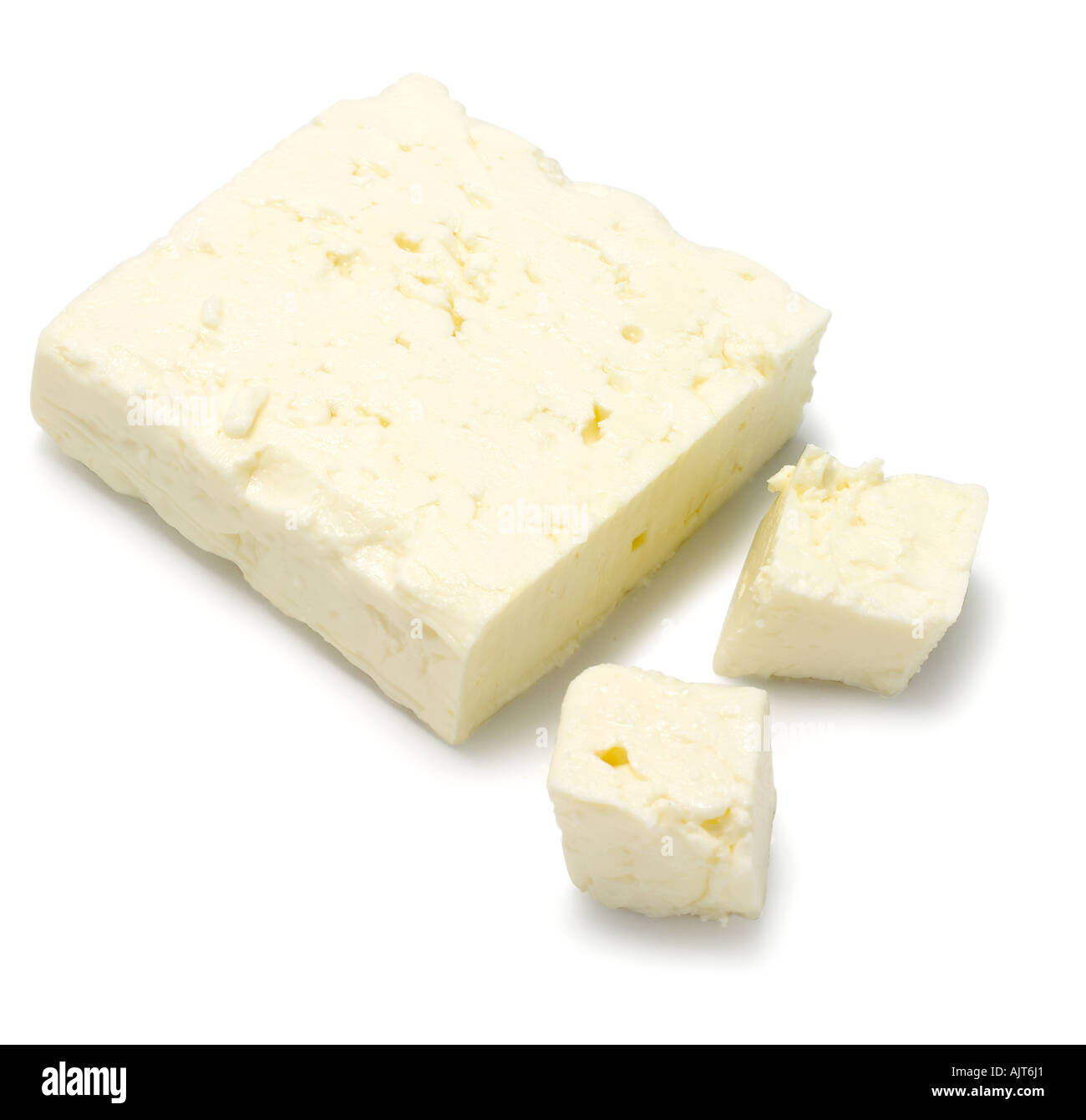 Feta Cheese cut out on white background Stock Photo - Alamy