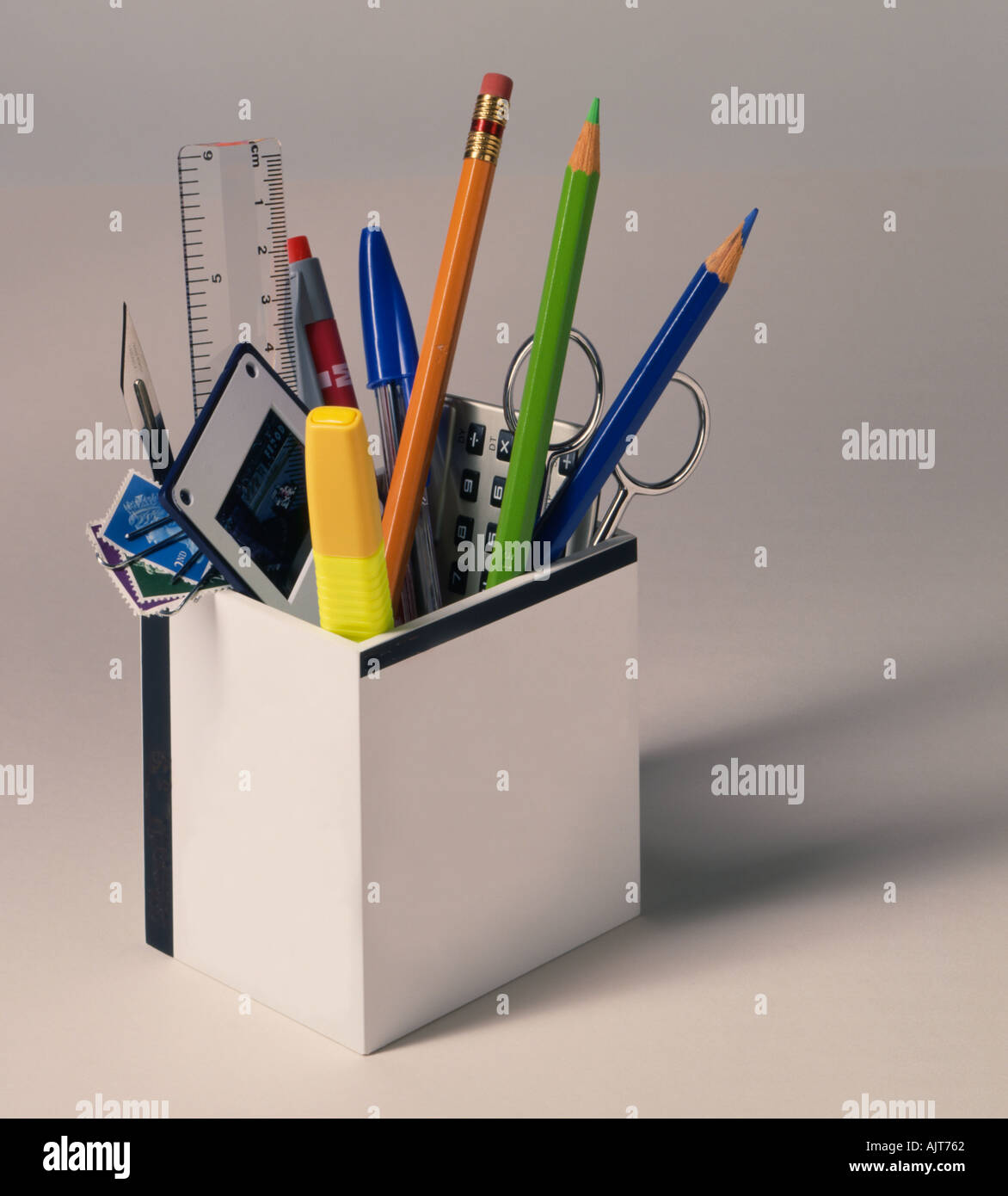 Desk pen holder with ruler pens scissors etc Stock Photo - Alamy